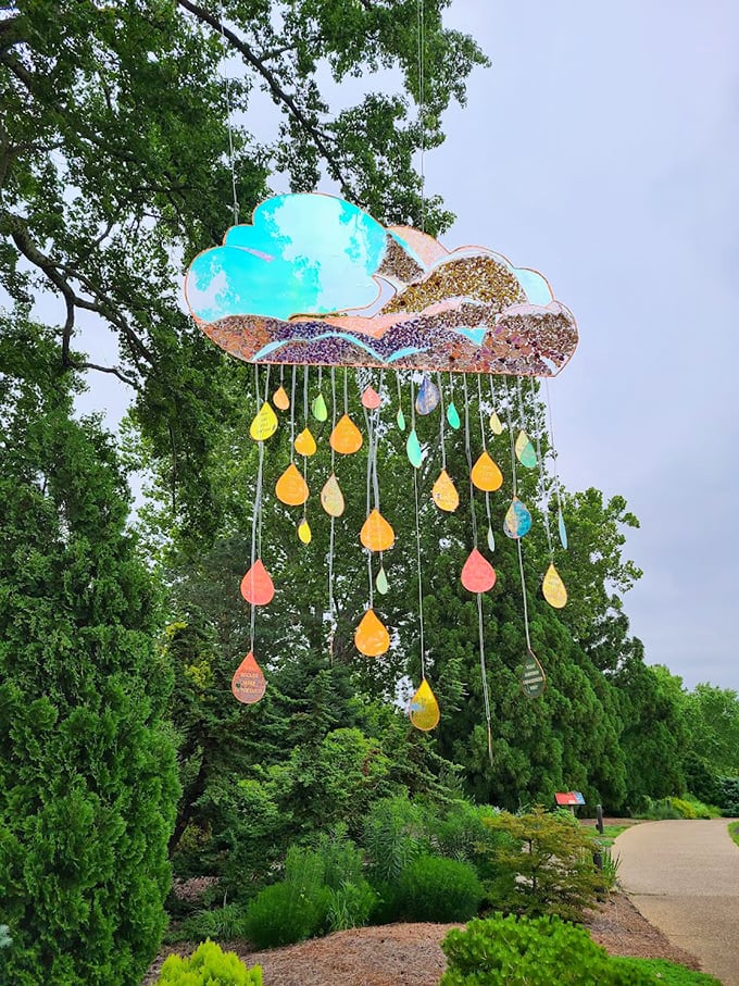Art meets nature with this whimsical cloud installation—raining colorful teardrops that somehow make even a gray day feel magical.