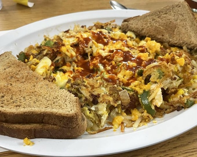 This isn't just an omelet with toast and potatoes—it's what morning victory looks like after surviving the alarm clock's tyranny.