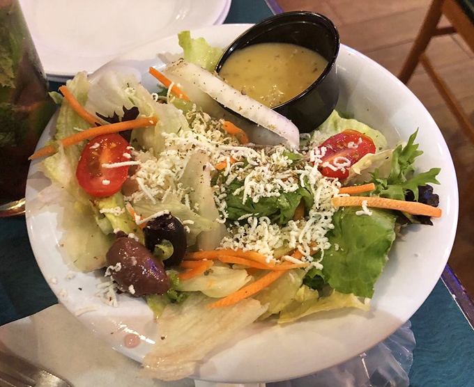 A Greek salad that proves vegetables can hold their own at a seafood joint. Fresh, crisp, and cheese-topped—it's the Mediterranean vacation your taste buds needed.