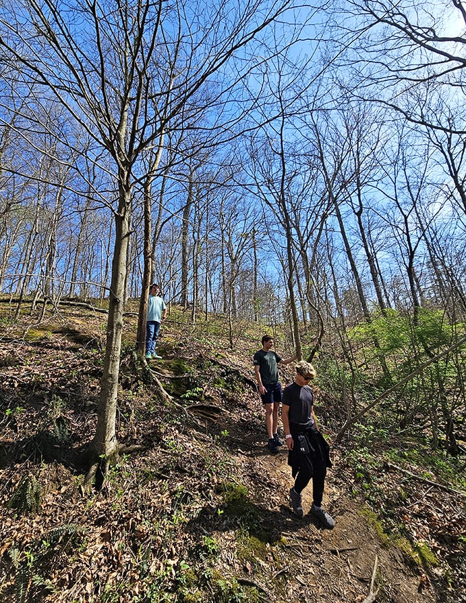 Fellow adventurers share the universal "how is this even possible?" expression that Jug Rock inspires.