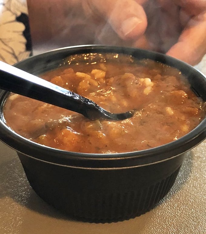 This gumbo doesn't need fancy presentation to tell its story – a rich, complex flavor that's been developing longer than most Hollywood romances.