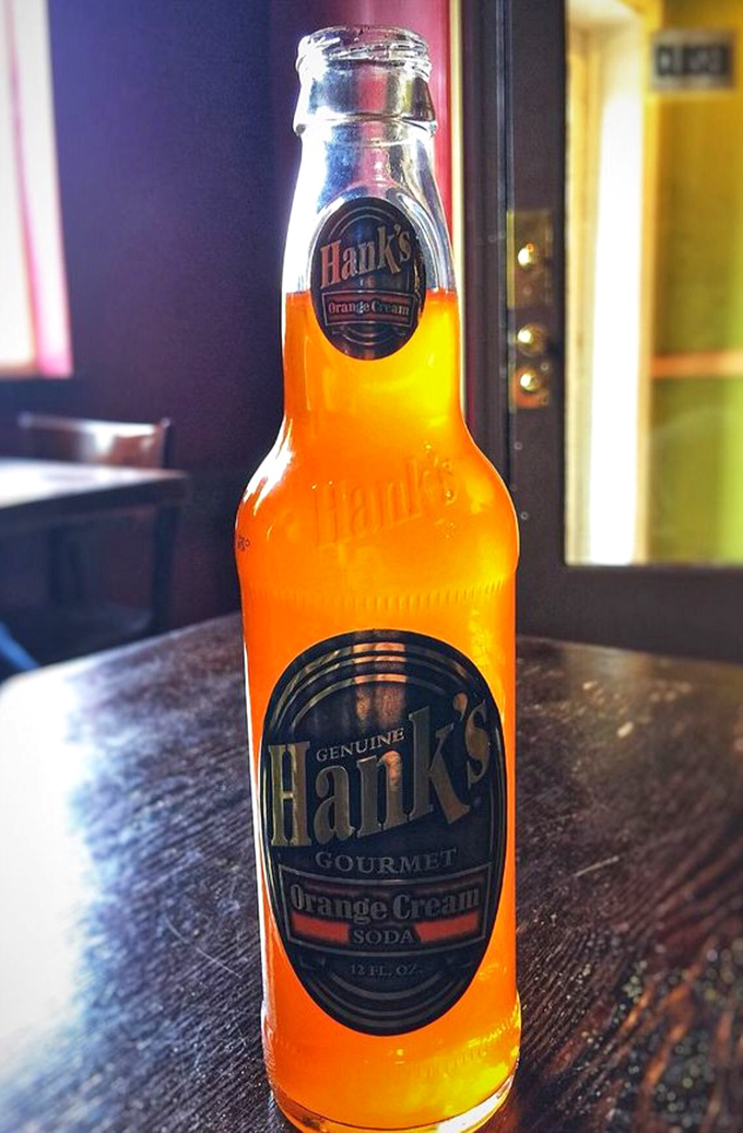 Even the beverages get special treatment here. Hank's Orange Cream Soda—like your childhood memories, but with better flavor development.