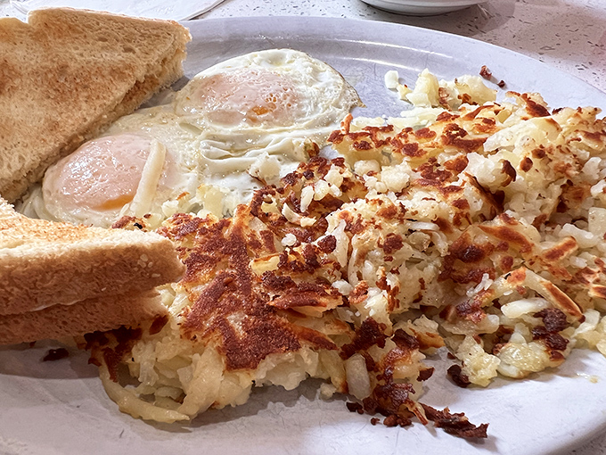 Crispy hash browns and sunny-side-up eggs—the breakfast duo that's been making mornings better since the invention of the griddle.