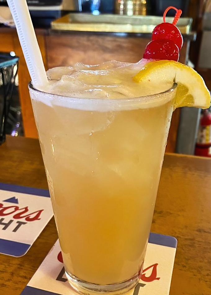 This isn't just a cocktail, it's summer in a glass – bright, refreshing, and garnished with enough fruit to count as a vitamin supplement.