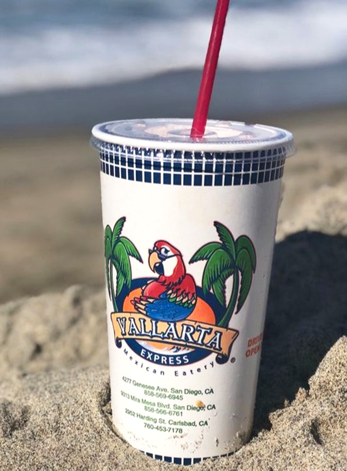 Horchata by the beach—the unofficial beverage of San Diego's finest food moments. That parrot logo knows what's up.