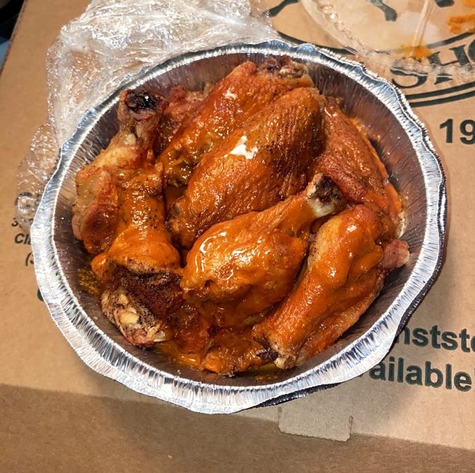 These wings aren't just hot, they're having a moment—glistening with sauce and practically begging to be the star of your lunch break.