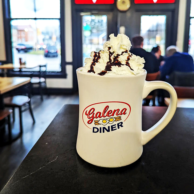 Hot chocolate that demands to be photographed before consumed. That whipped cream mountain with chocolate drizzle would make Swiss chocolatiers nod in approval.