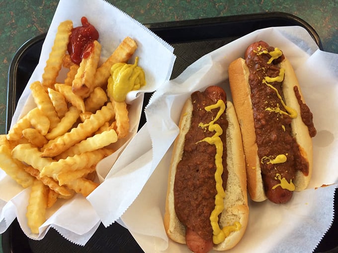 Hot dogs dressed with mustard—proof that sometimes the classics need no improvement. Like Sinatra in a tuxedo, some things are eternally right.