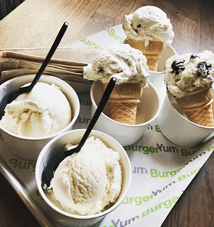 Ice cream scoops standing tall like edible monuments to dairy perfection. The kind of dessert lineup that makes choosing feel like Sophie's Choice.