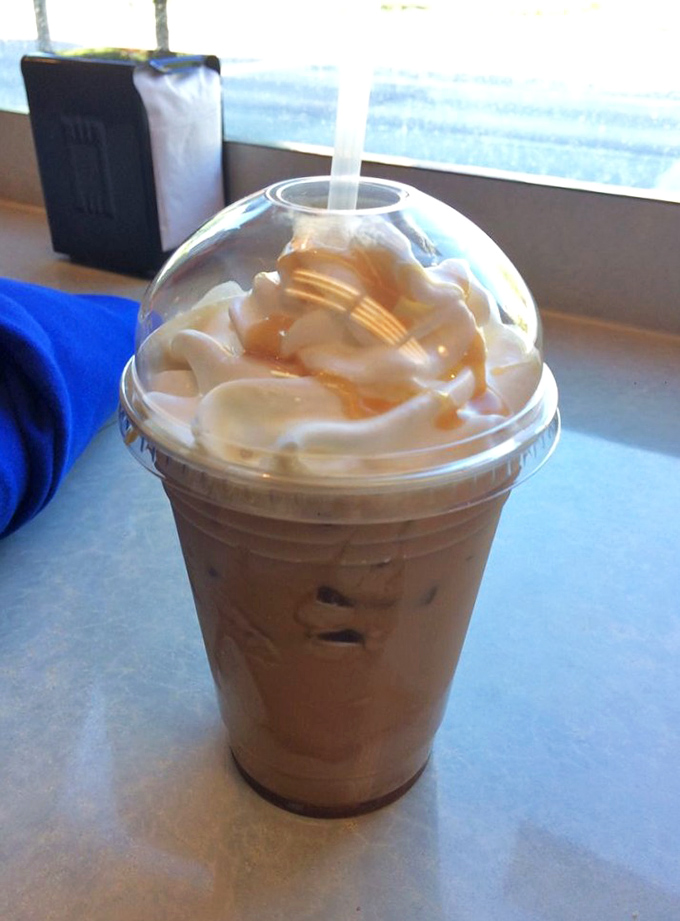 Coffee artistry without pretension—caramel and cream transform ordinary caffeine into something worth getting out of bed for.