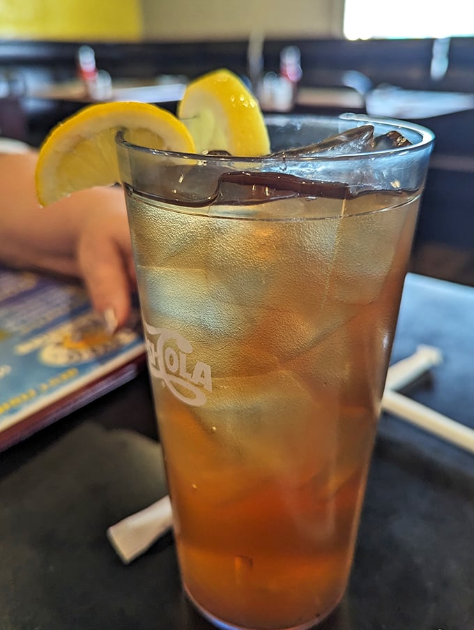 Sweet tea so refreshing it deserves its own swimming pool on a hot Indiana day. Those lemon slices aren't just garnish—they're necessary co-conspirators.
