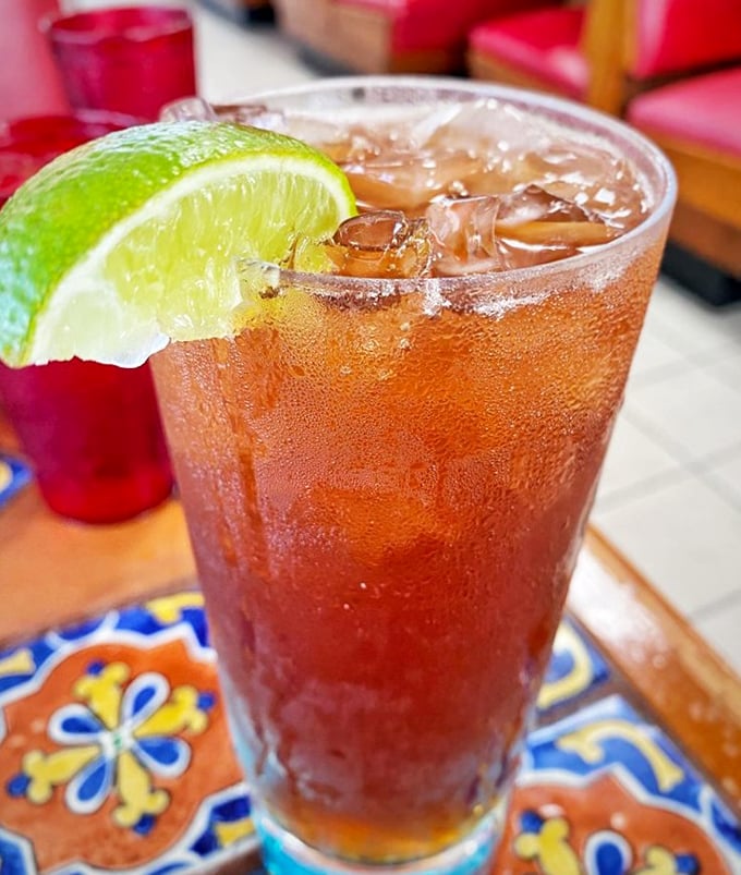 Iced tea so refreshing it deserves its own swimming pool—that lime wedge is just showing off at this point.