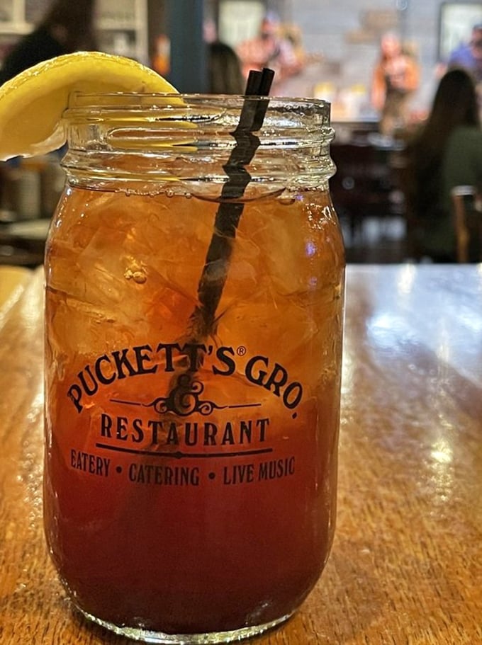 Sweet tea served in a mason jar – because in Tennessee, proper hydration comes with Southern credentials and a lemon slice.