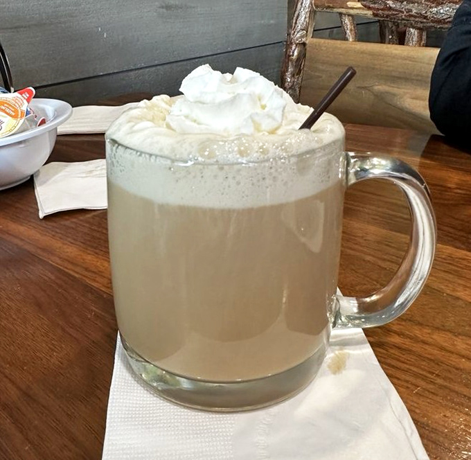 An Irish coffee topped with a cloud of whipped cream—because sometimes breakfast needs a little diplomatic immunity from the day ahead.