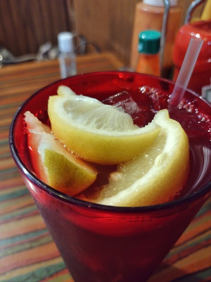 That ruby-red iced tea with fresh lemon slices isn't just a beverage – it's the unofficial state drink of the South, served properly chilled.