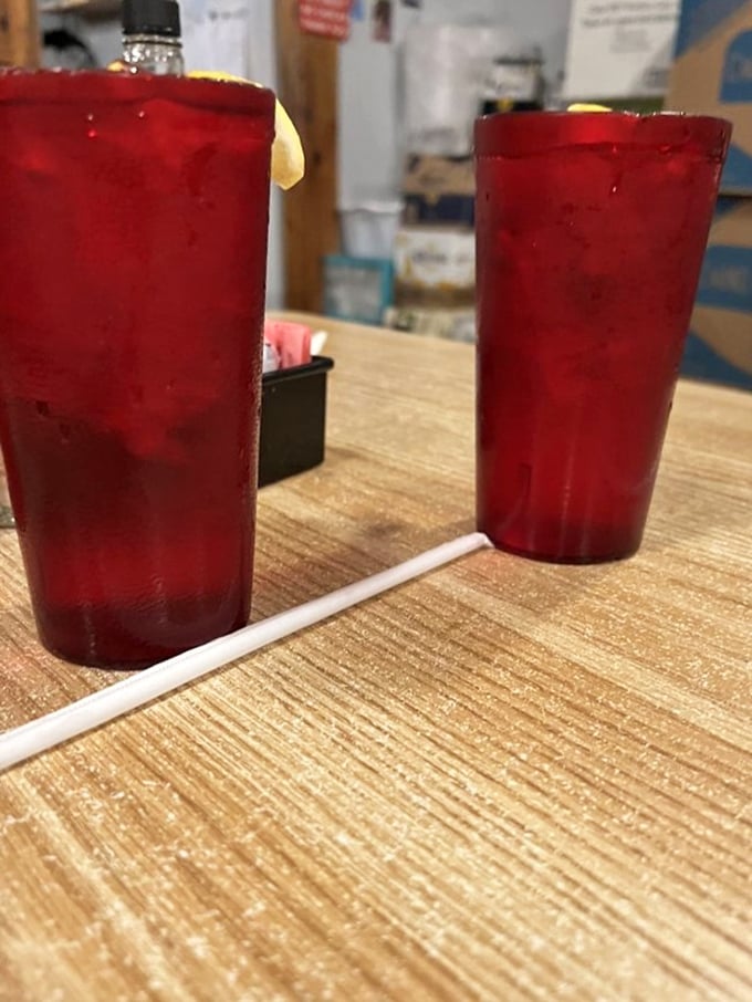 Ruby-red drinks in plastic tumblers—sometimes the simplest pleasures are the perfect accompaniment to seafood feasts.