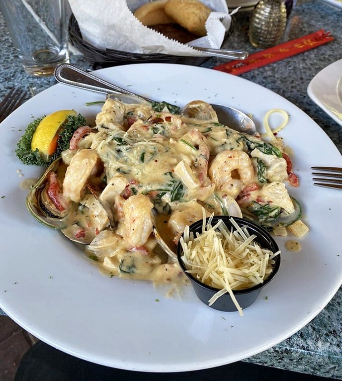 Pasta swimming in creamy sauce with plump shrimp and lobster pieces throughout. Carb-loading has never felt so justified or deliciously necessary.