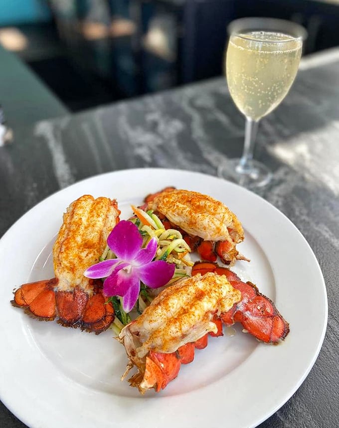 Lobster tails so beautifully presented they deserve their own Instagram account. Paired with a glass of bubbly, this is what vacation dreams are made of.