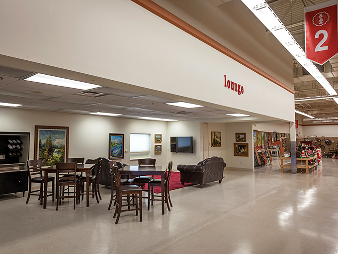 The lounge area—where spouses wait patiently while partners mutter "just one more booth" for the fifth time. A sanctuary amid the hunt.
