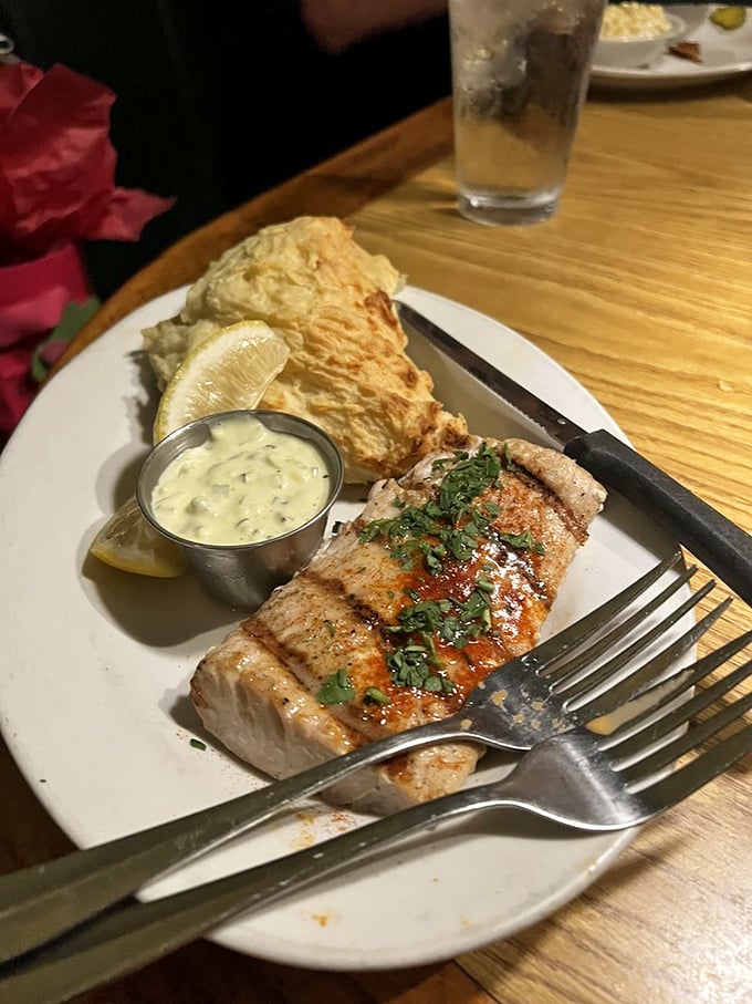 Mahi-mahi grilled with the precision of a NASA launch, accompanied by a potato that's having its own moment of glory.