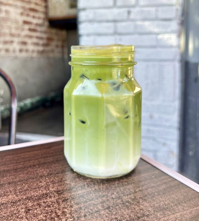 That green glow isn't radioactive—unless you count the energy boost this mason jar of iced matcha will give your morning routine.