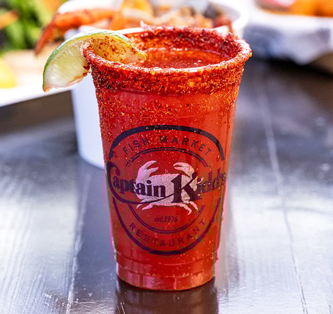 This isn't just a Michelada—it's a spicy liquid handshake from the sea, complete with the Captain's seal of approval. That rim deserves respect.