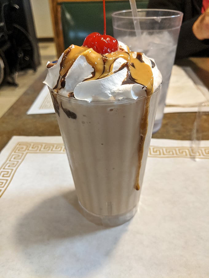 A milkshake that understands the importance of excess. Whipped cream, caramel, chocolate, and a cherry – because sometimes more really is more.