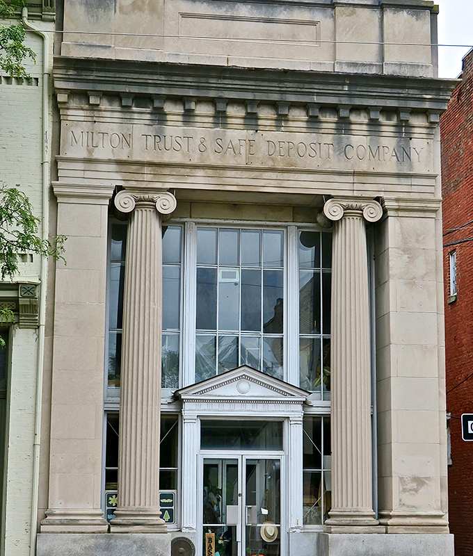 The Milton Trust & Safe Deposit Company's imposing columns weren't just for show—they silently announced "your money isn't stuffed in a mattress here."