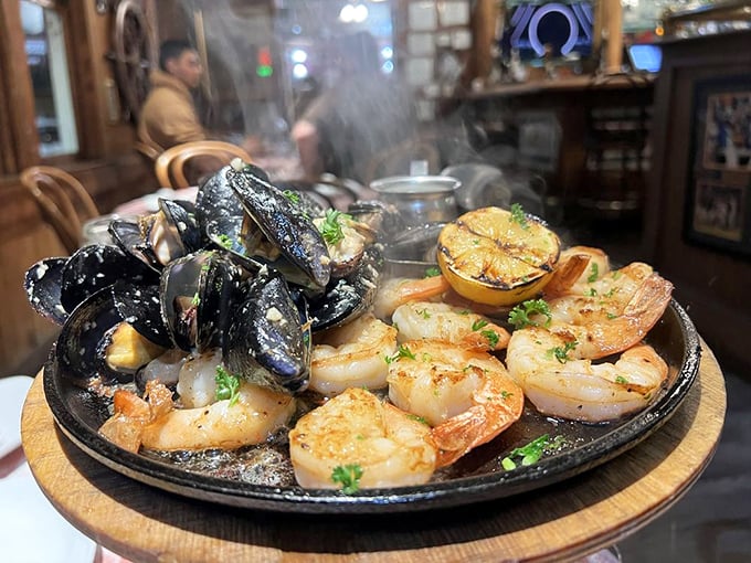 Sizzling skillets don't just make an entrance—they announce themselves with aromatic fanfare that turns every head in the dining room.