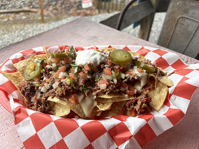 BBQ nachos: where Tex-Mex meets Georgia smoke in a beautiful cross-cultural romance. Those pickled jalapeños cut through richness like witty banter.