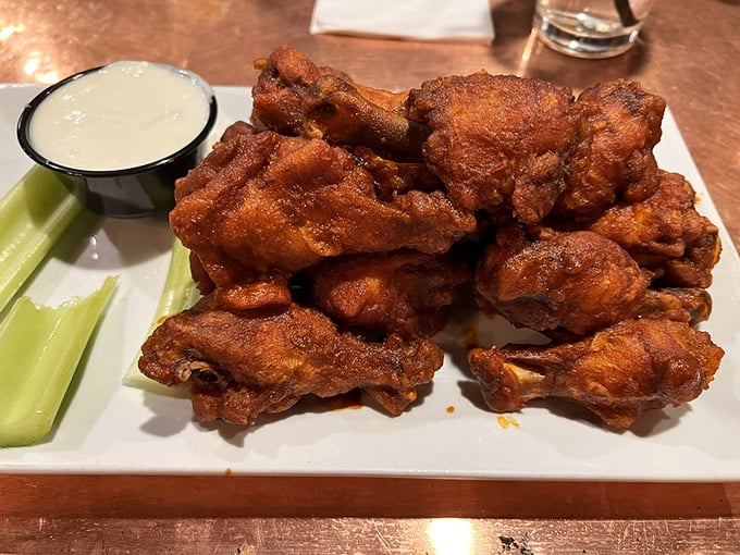 Nashville hot wings that make you understand why people write songs about Tennessee. These crispy, fiery morsels demand respect—and plenty of napkins.