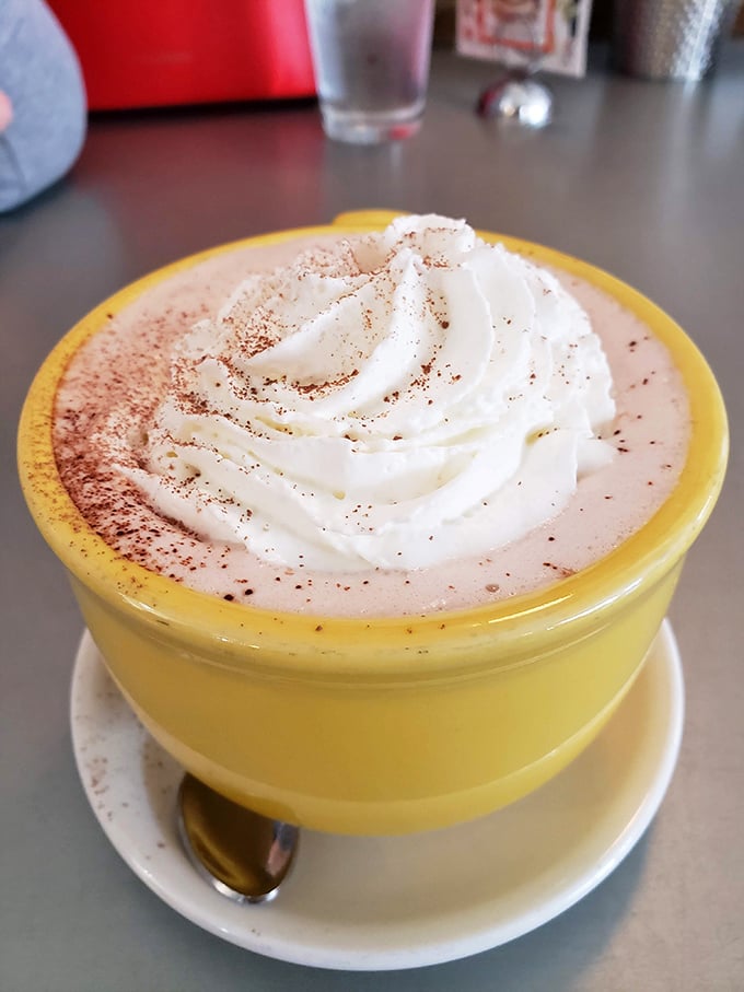 This isn't just hot chocolate—it's a Nutella mocha that puts ordinary coffee to shame. The whipped cream mountain on top is non-negotiable.