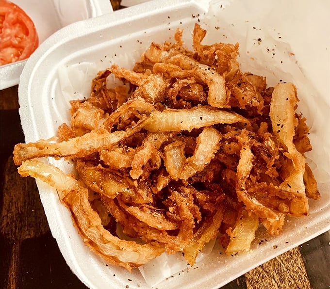 Thee Onion Thangs aren't just onion rings; they're crispy golden halos that make you wonder why you ever settled for lesser versions of this classic side.