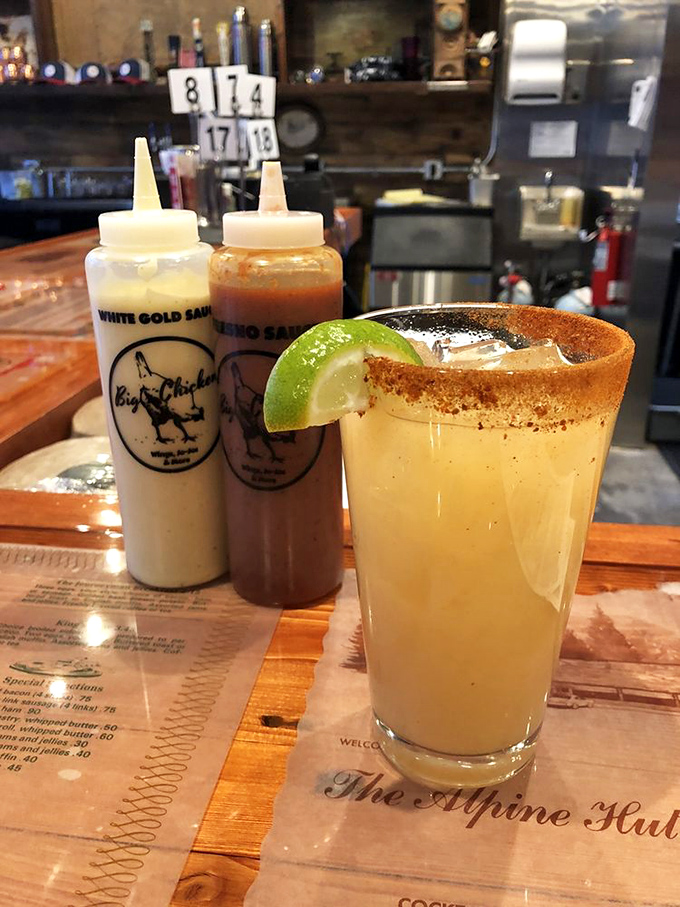 The house paloma provides a refreshing citrus counterpoint to all that rich chicken. That rim of tajin spice is the chef's kiss.