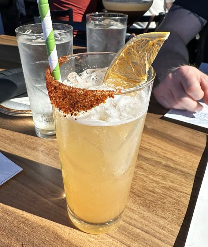 A paloma with attitude—rimmed with spice and garnished with dehydrated citrus. It's sunshine in a glass, Pacific Northwest style.