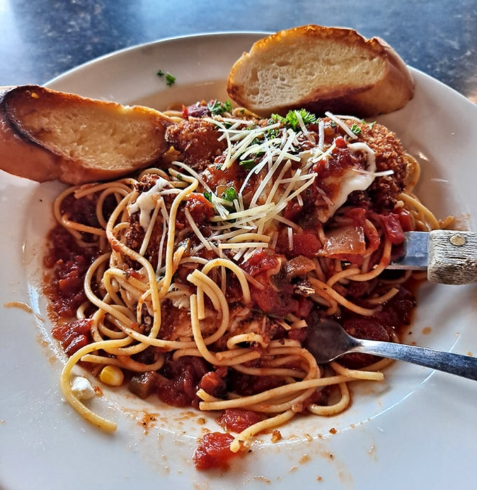 Spaghetti and garlic bread that could make an Italian grandmother nod in approval – simple, hearty, and exactly what you're craving.