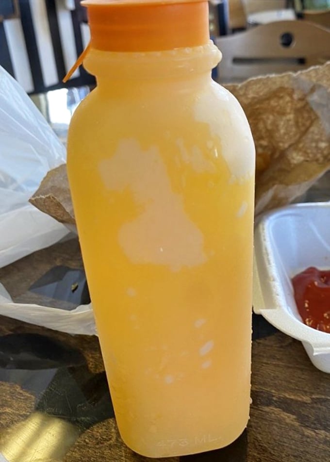 This isn't just a drink; it's Florida sunshine bottled up and served cold—the perfect companion to tame the heat of spicy menu items.