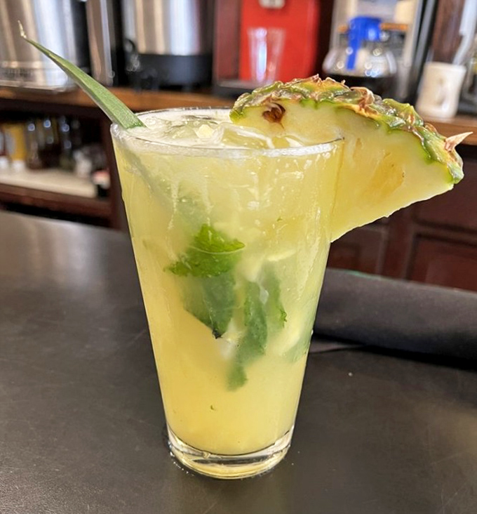 This pineapple mojito isn't just refreshing—it's what vacation would look like if it took liquid form and decided to brighten your Tuesday.