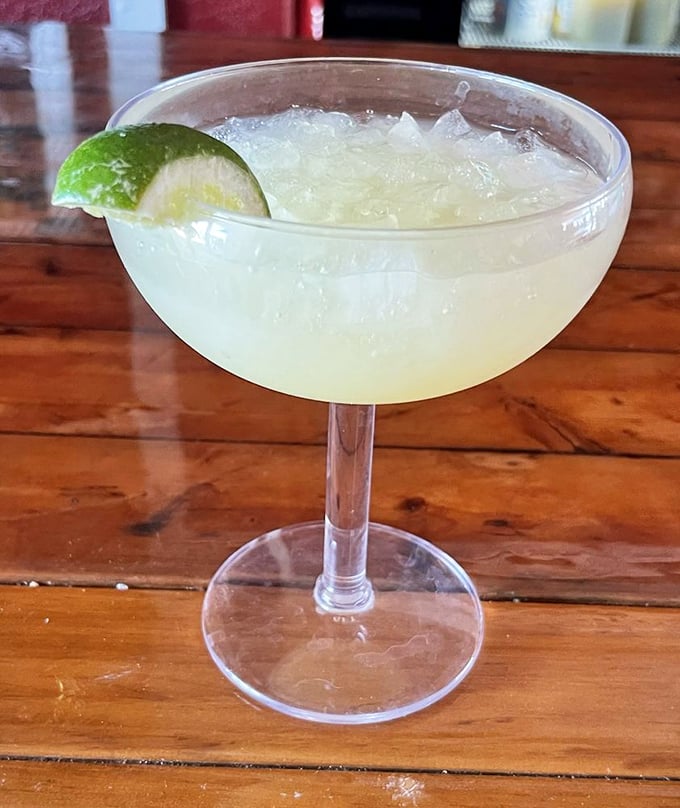 This isn't just a margarita—it's Florida sunshine in liquid form, with a lime perched on the rim like it's enjoying the view too.