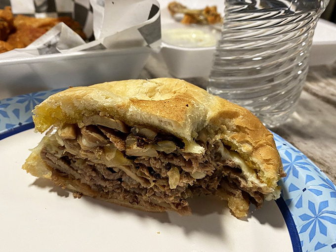 The prime rib sandwich—where magnificent meat meets humble bread in a union so perfect, it should have its own wedding registry.