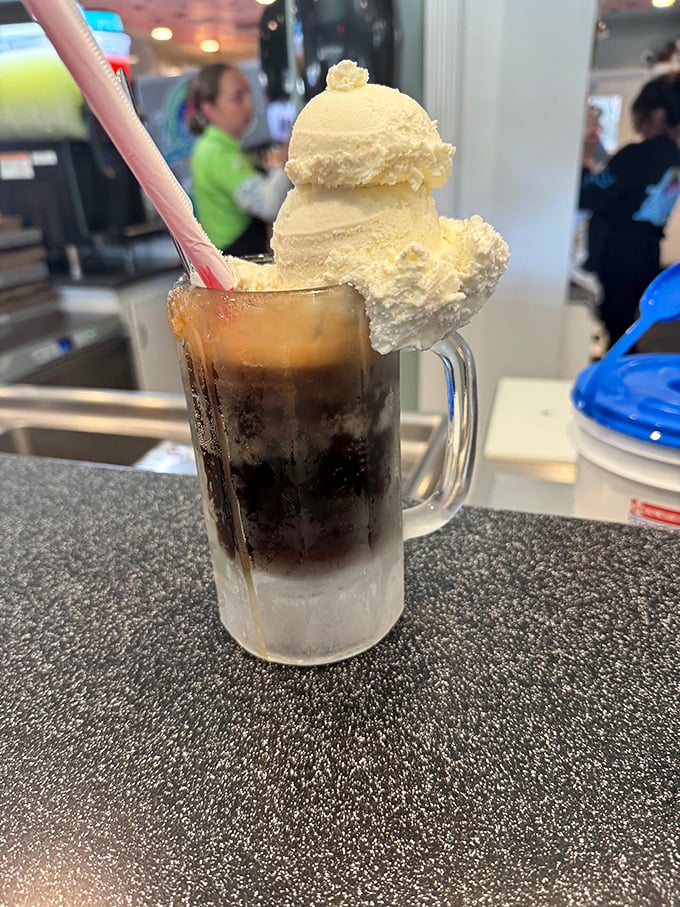 This isn't just a root beer float—it's a physics-defying masterpiece where ice cream somehow remains both solid and liquid simultaneously.