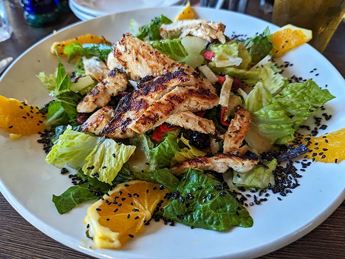 A salad that seafood lovers can actually get excited about. Those grilled chicken strips look like they're auditioning for a starring role.