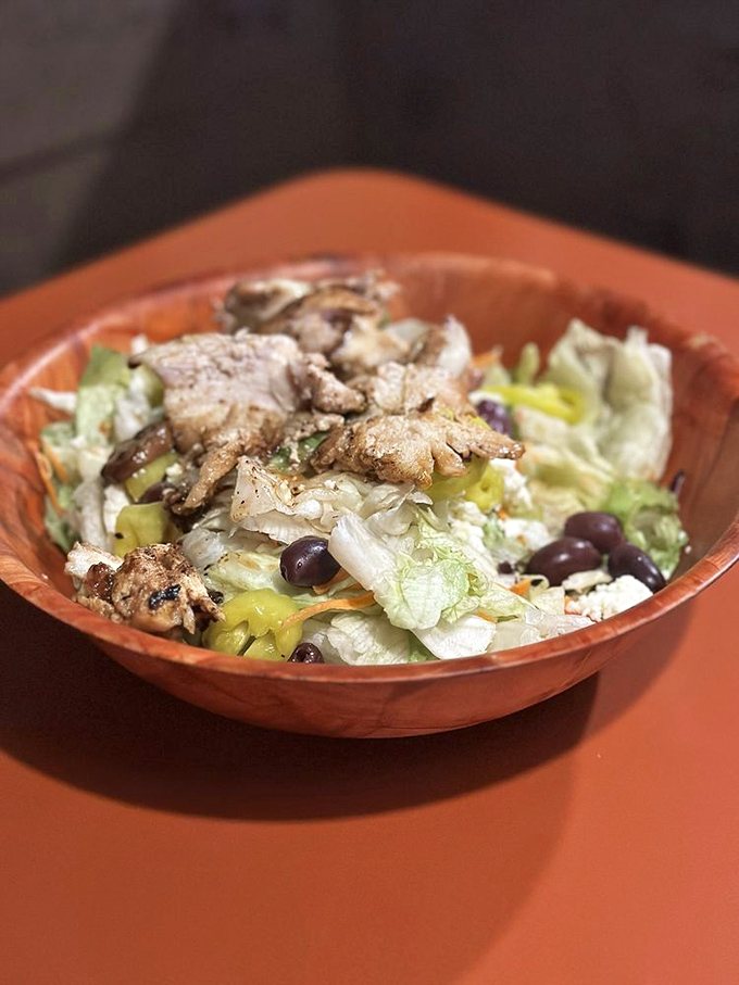 Even the salads at Thurman's come with a wink—"Yes, it's healthy…ish," they seem to say, as grilled chicken lounges atop crisp greens.
