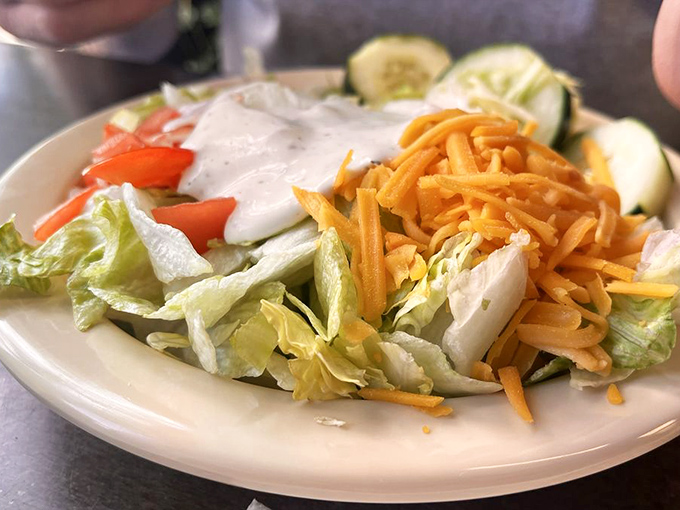 Even the salad gets the Southern treatment—honest ingredients with no pretension. The cheese isn't "shaved" or "artisanal"—it's gratifyingly grated.