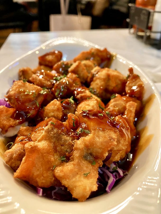 These crispy morsels aren't just appetizers—they're conversation stoppers. One bite of these glazed delights and you'll forget mid-sentence what you were saying.