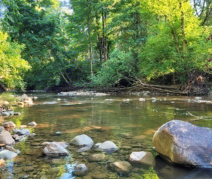 Clear waters reveal a riverbed mosaic of perfectly tumbled stones – nature's version of a zen garden that's been thousands of years in the making.