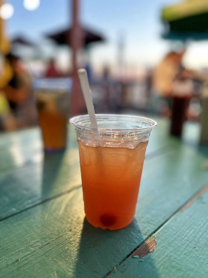 Sweet tea in plastic cups – the unofficial champagne of Southern seafood feasts, best enjoyed as the sun dips below the Intracoastal.