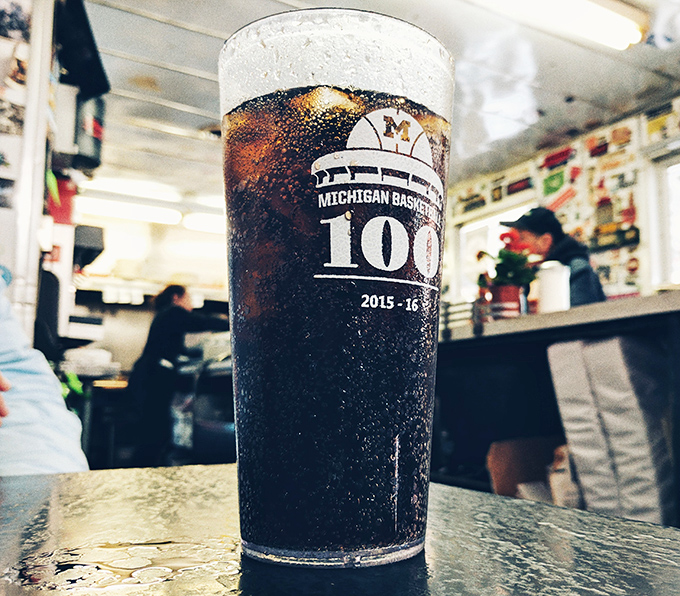 Even the drinks come with a side of Michigan pride—cold soda served in glasses that celebrate local heritage.