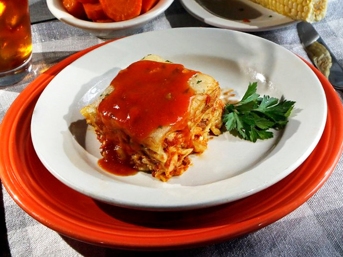 Southern-style lasagna brings a blush of tomato sauce and a sprinkle of parsley to the table—proof that Italians don't have a monopoly on comfort.
