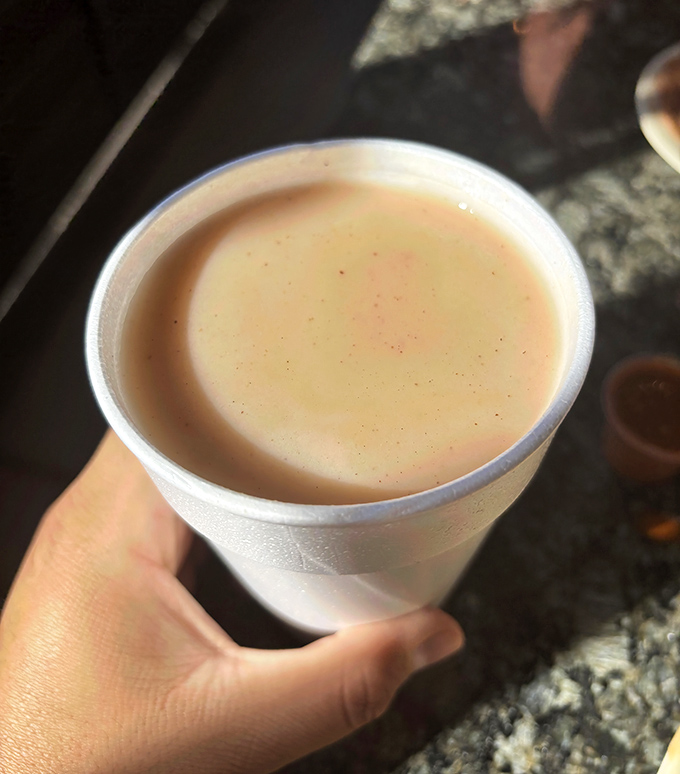 The creamy horchata comes in a humble styrofoam cup, but don't be fooled—this cinnamon-kissed rice drink is the nectar of the gods.